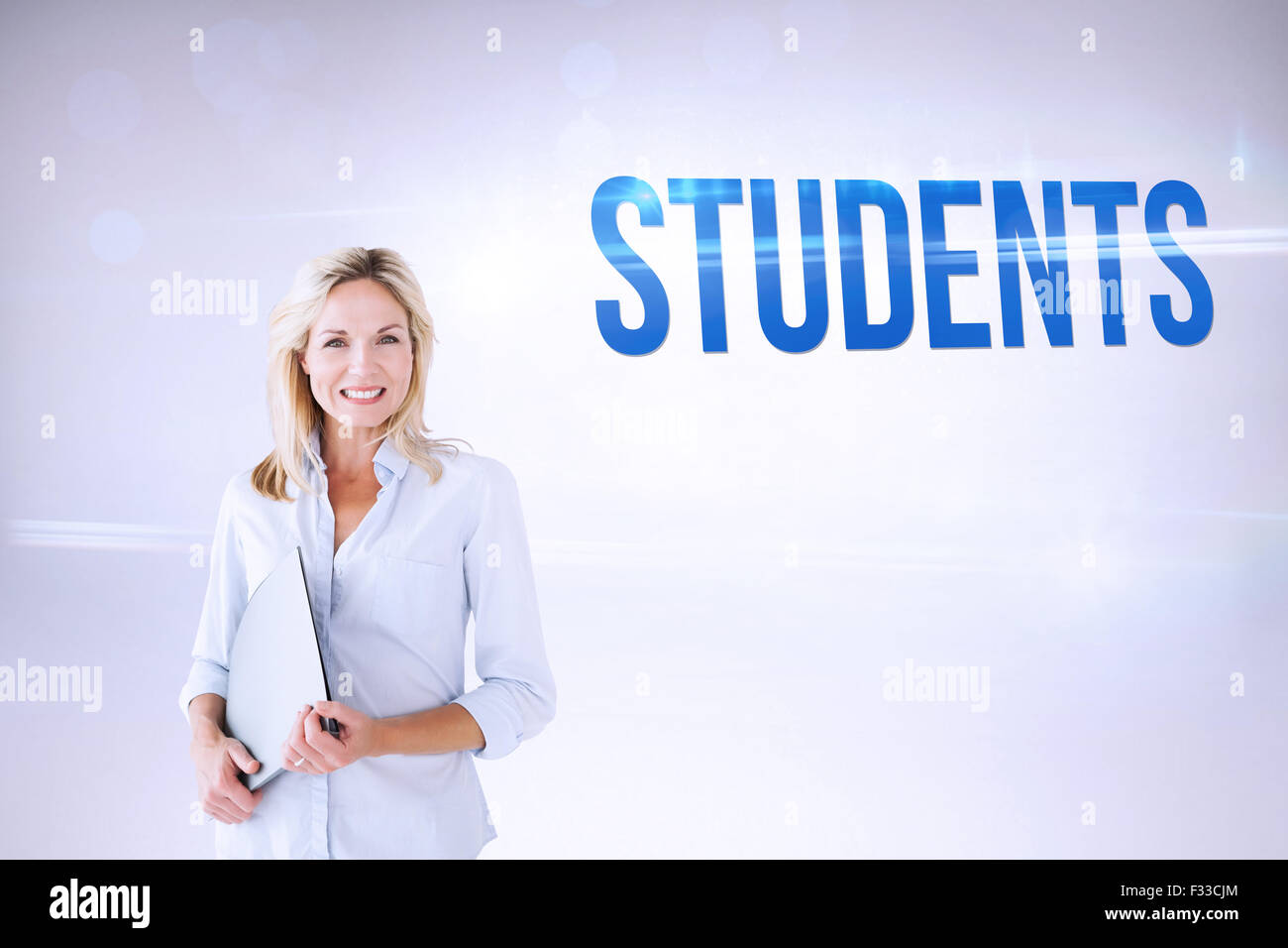 Students against grey background Stock Photo - Alamy