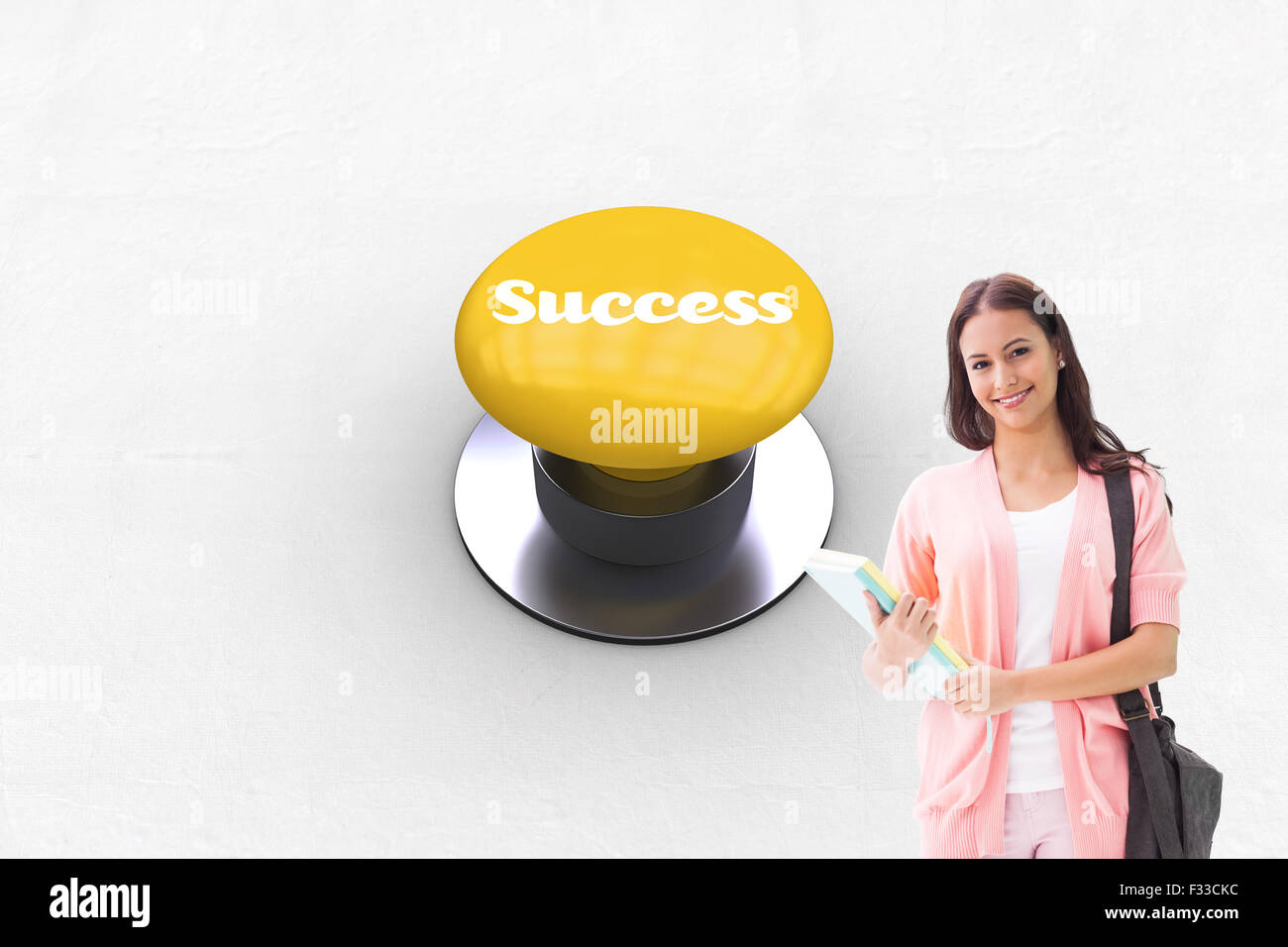 Success against yellow push button Stock Photo - Alamy