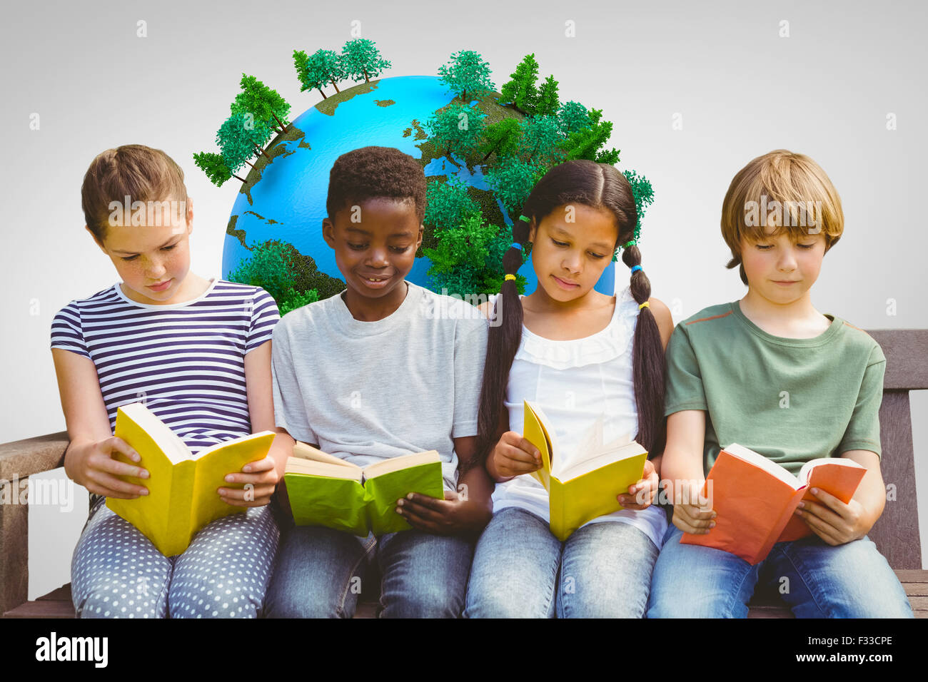 Composite image of children reading books at park Stock Photo - Alamy