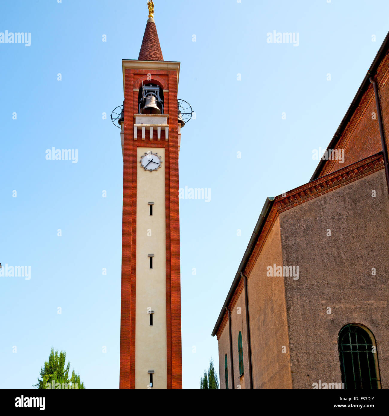 ancien clock tower in italy europe old stone and bell Stock Photo - Alamy