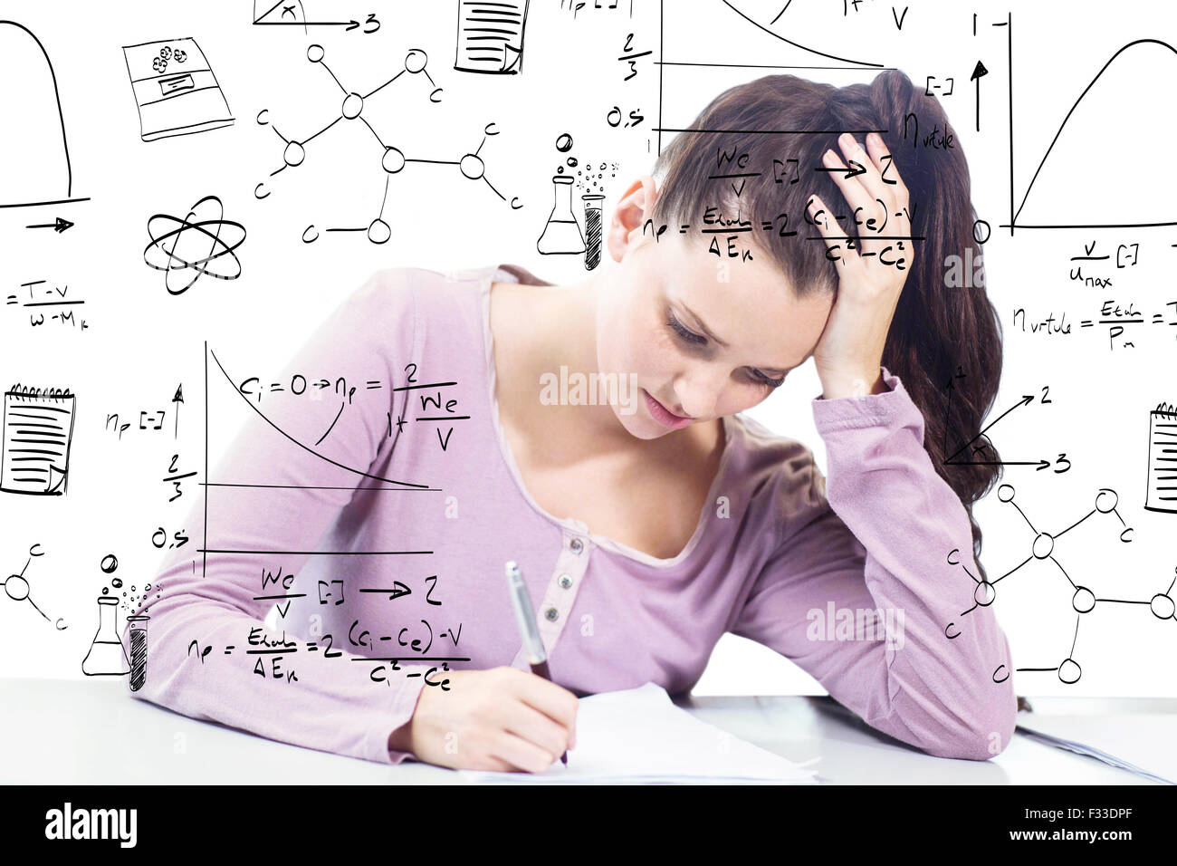 Young female student doing math hi-res stock photography and images - Alamy
