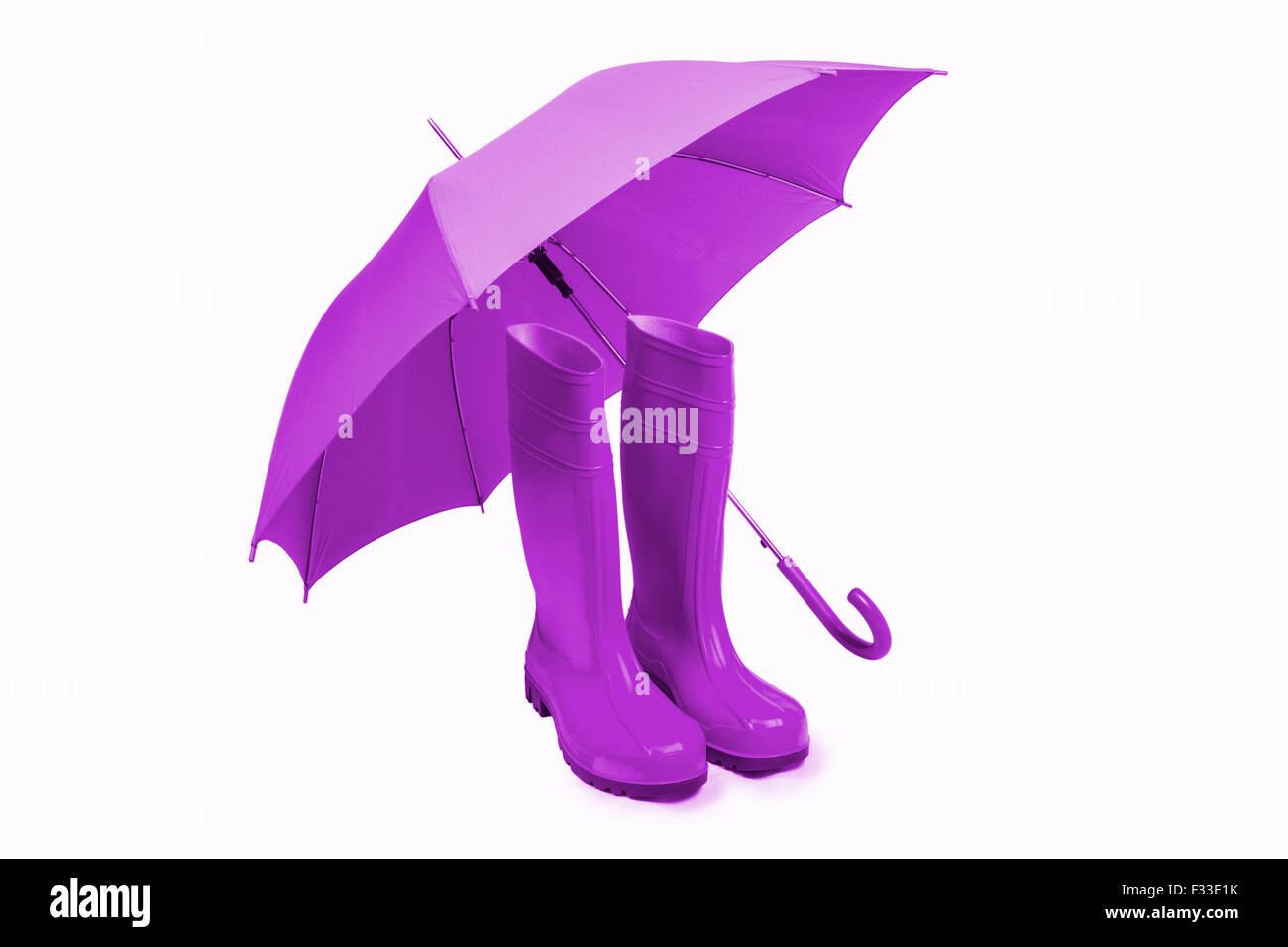 Violet rubber boots and umbrella isolated Stock Photo - Alamy
