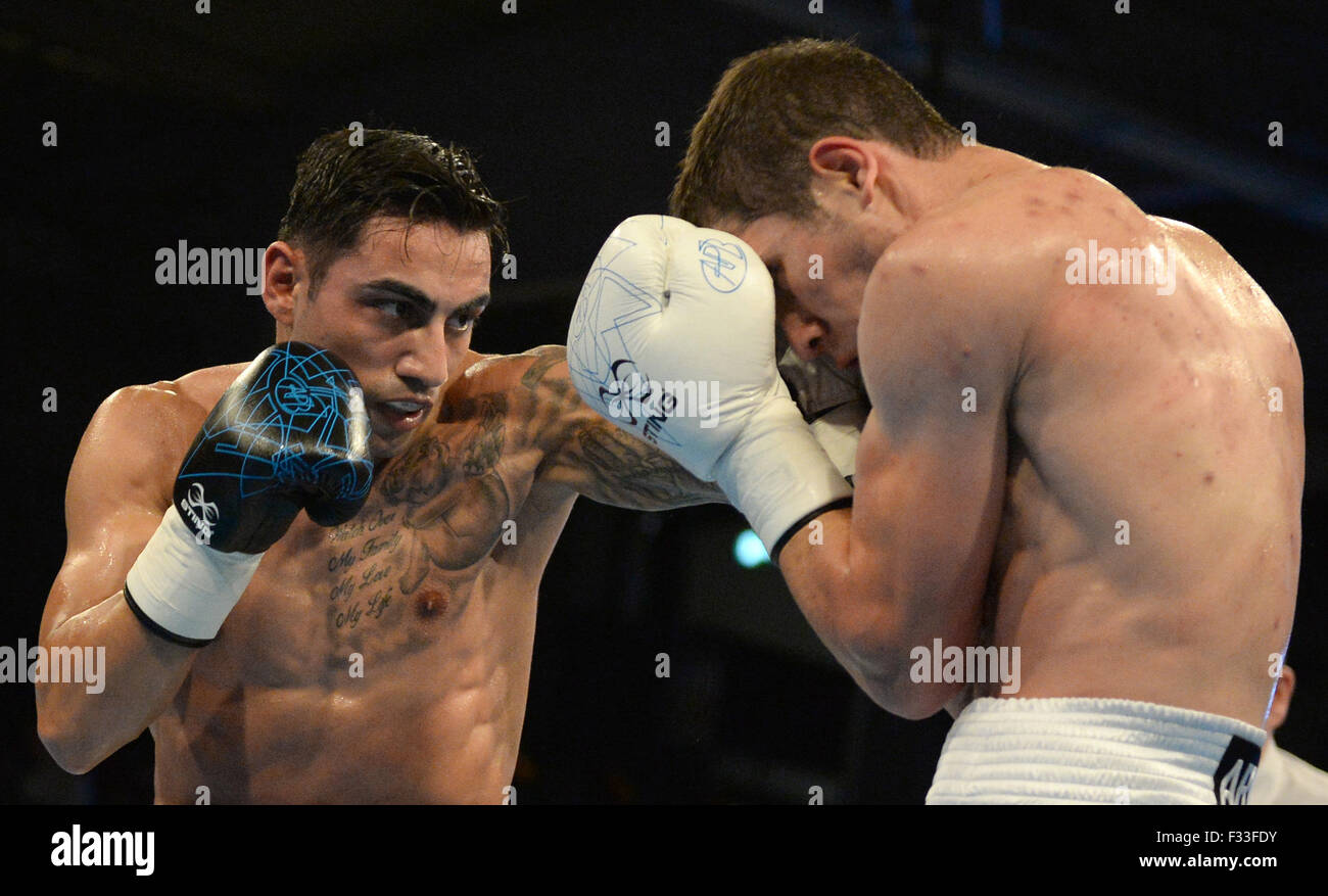 World champion Artem Harutyunyan (L) of Germany faces Armen Sakarjan of ...