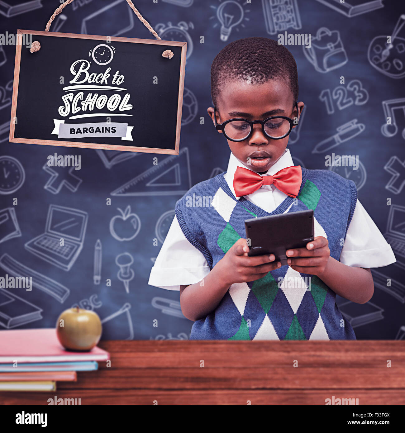 Composite image of pupil with calculator Stock Photo - Alamy