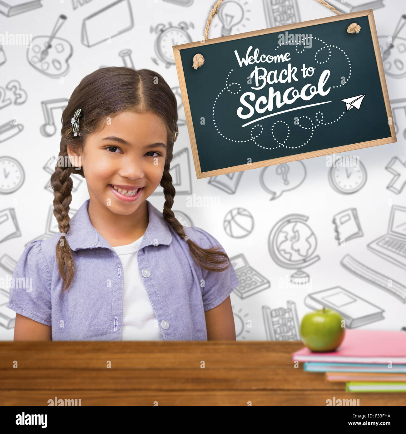 Composite image of happy pupil Stock Photo - Alamy