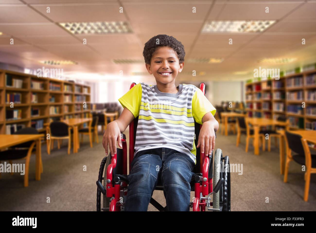 Composite image of cute disabled pupil smiling at camera in hall Stock ...