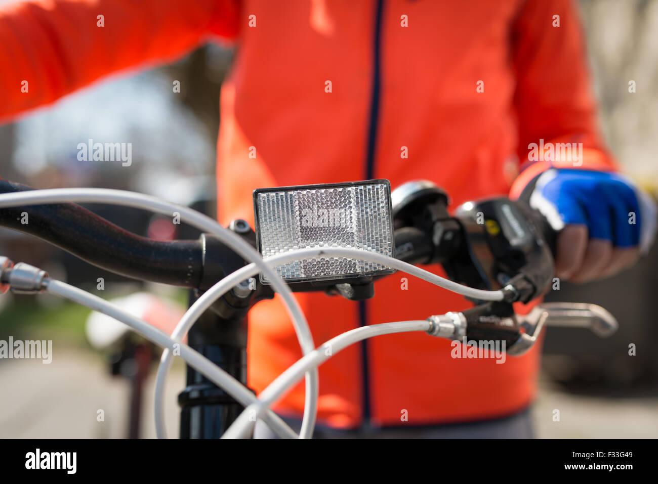 Front white reflector on bike Stock Photo - Alamy