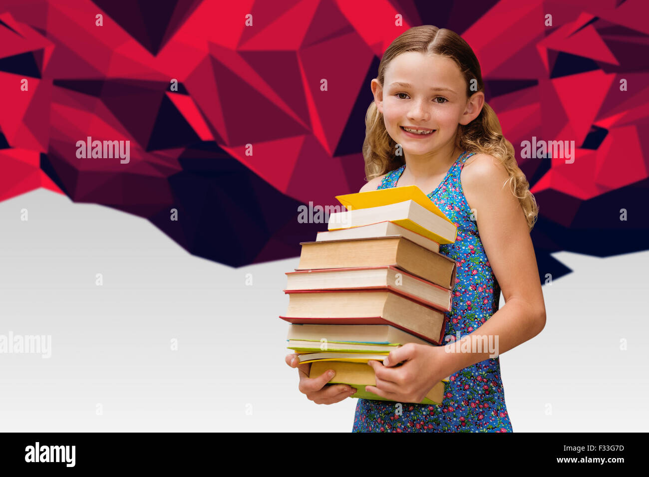 Composite image of cute little girl carrying books in library Stock ...