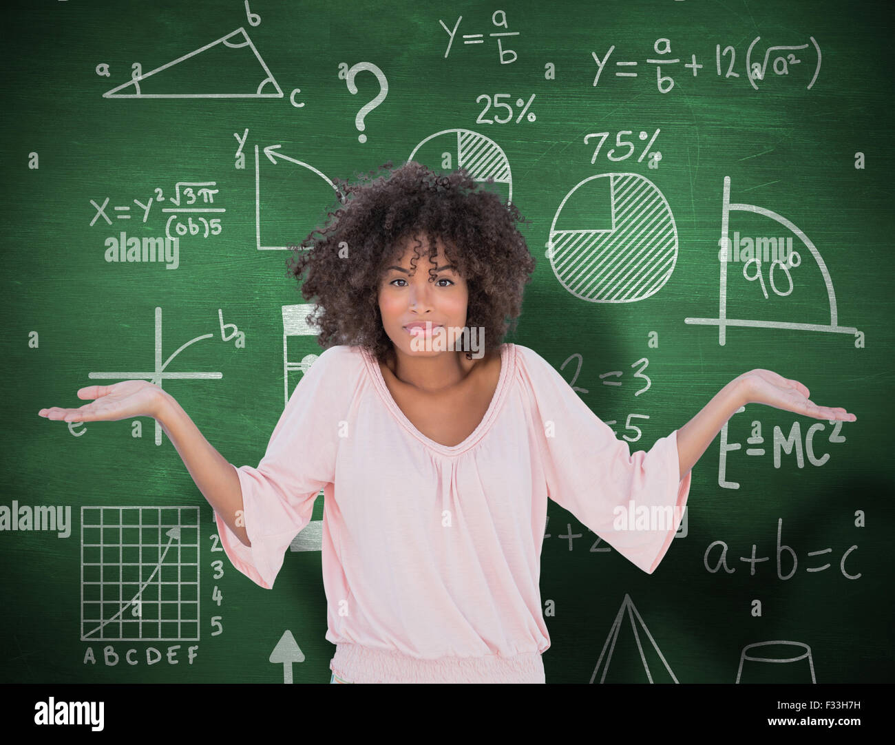 Composite image of pretty woman raising arms questioningly Stock Photo ...