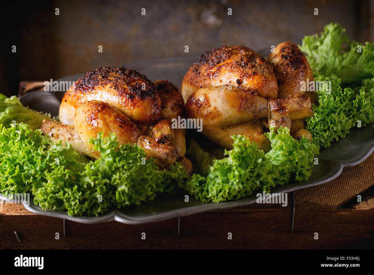Grilled mini chicken Stock Photo - Alamy