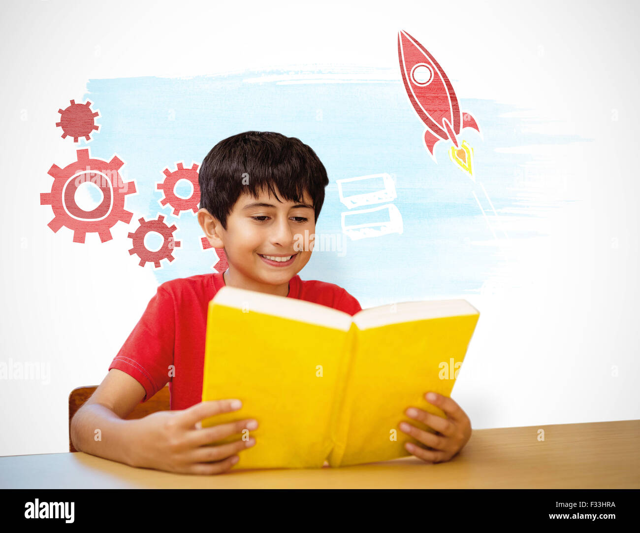 Composite image of cute boy reading book in library Stock Photo - Alamy