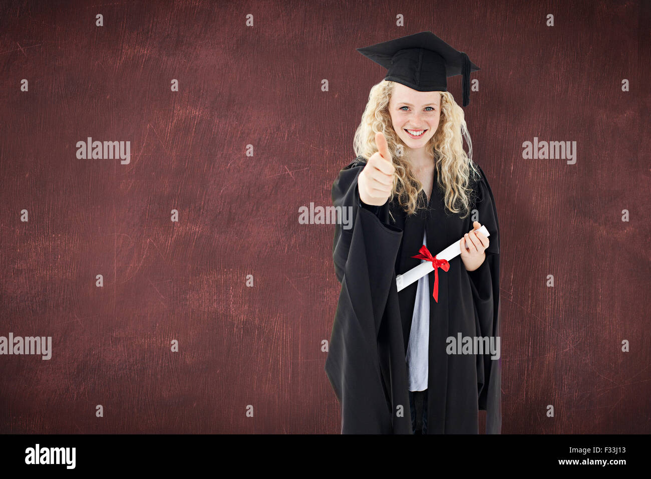Composite image of teenage girl celebrating graduation with thumbs up ...