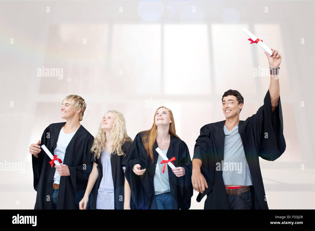 Composite image of group of people celebrating after graduation Stock ...