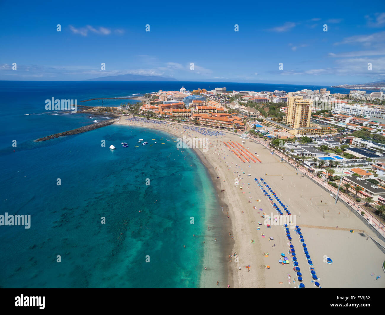 Aerial shot of beautiful beach and ocean in Adeje Playa de las Americas ...
