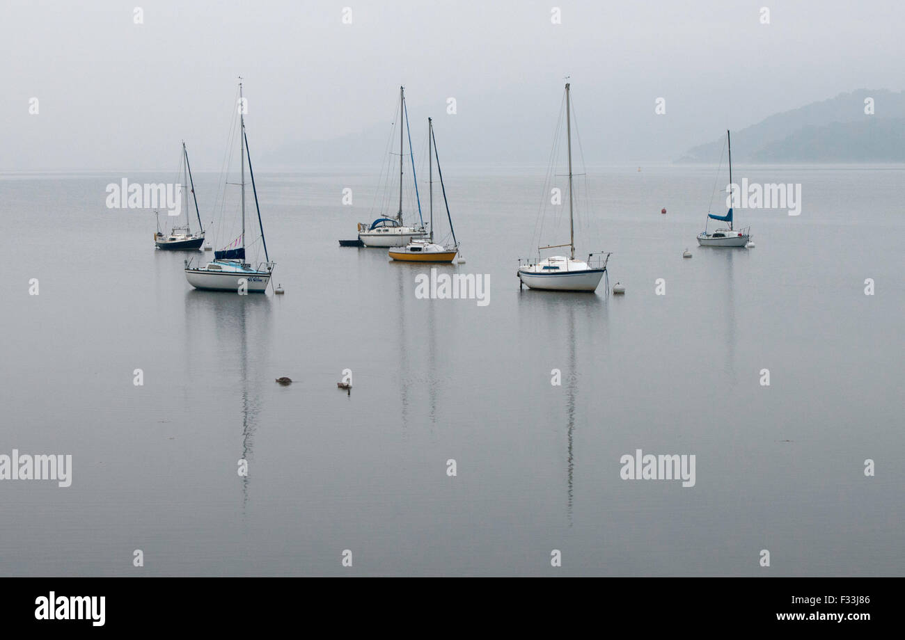 Misty sail boats on Lake Windermere Stock Photo - Alamy