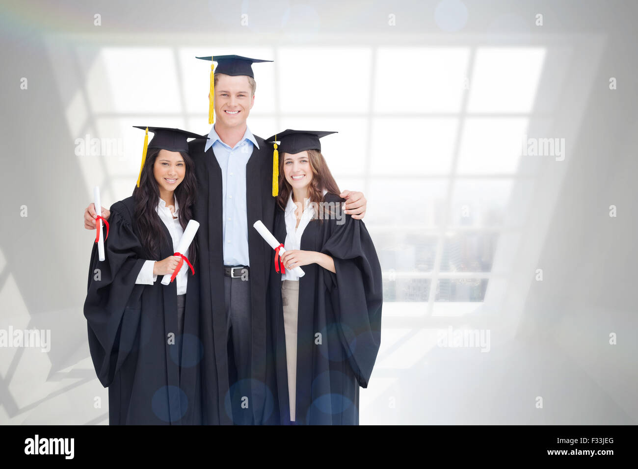 Composite image of full length of three friends graduate from college ...
