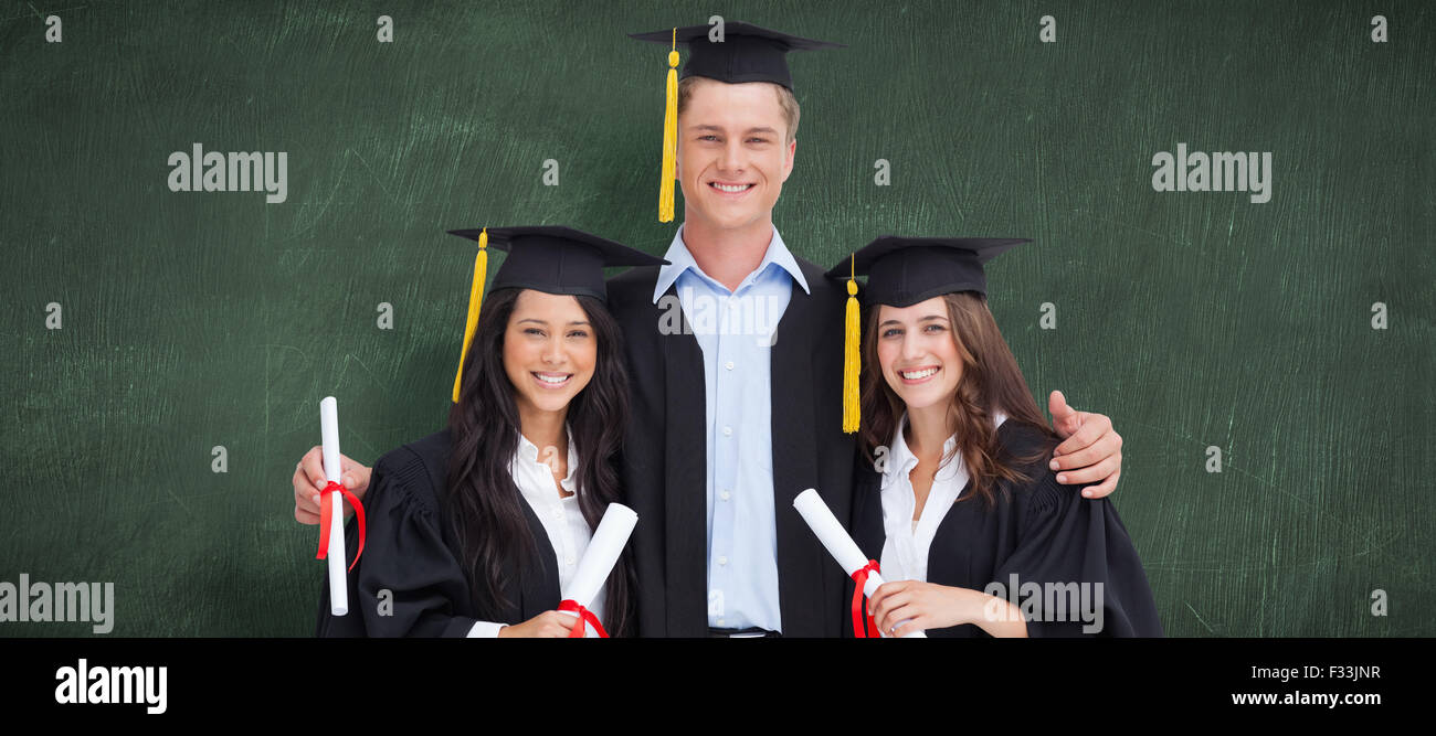 Composite image of three friends graduate from college together Stock ...