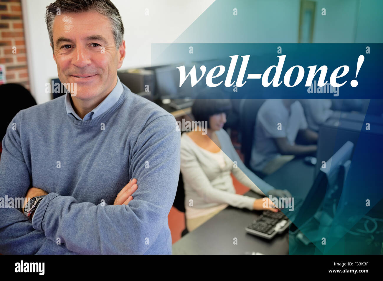 Well-done! against teacher smiling at top of computer class Stock Photo ...