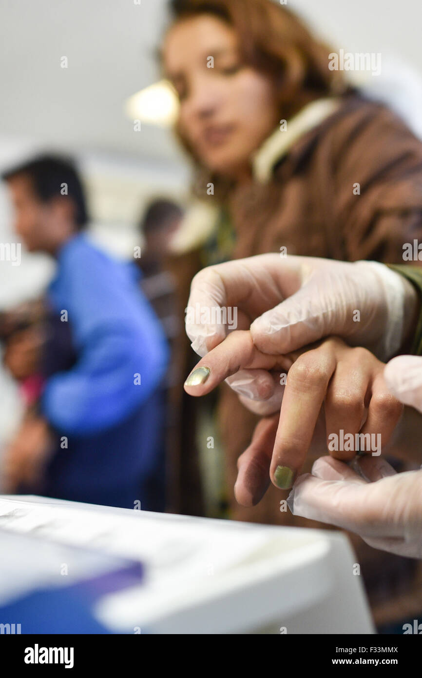 Heidelberg, Germany. 29th Sep, 2015. An employee takes fingerprints of ...