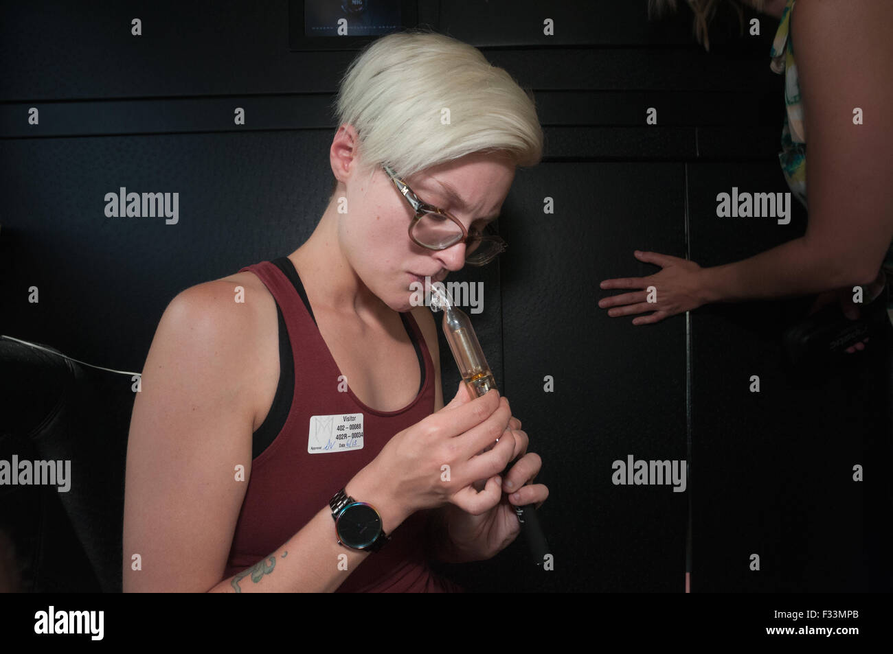 Smoking marijuana on a cannabis bus tour. Denver, CO Stock Photo - Alamy