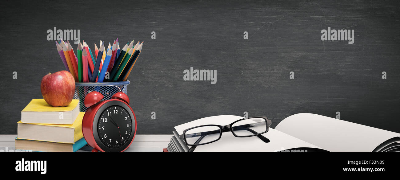 Composite image of school supplies on desk Stock Photo - Alamy