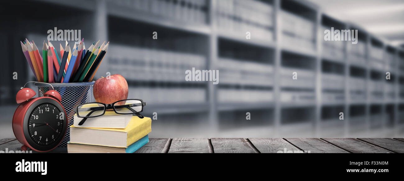 Composite image of school supplies on desk Stock Photo - Alamy
