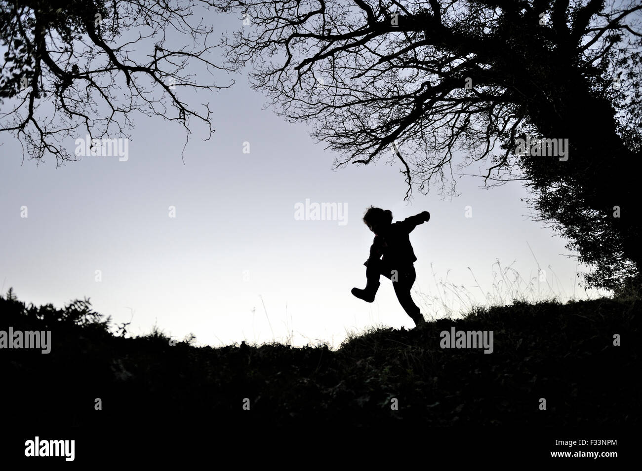 Kid running silhouette hi-res stock photography and images - Alamy
