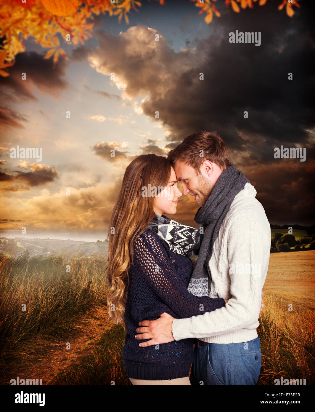 Composite image of side view of young couple embracing Stock Photo - Alamy