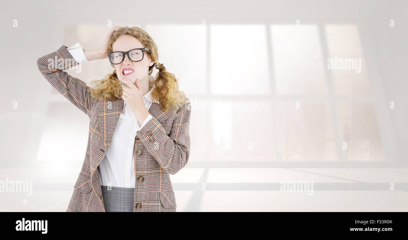 Composite image of geeky hipster thinking with hands on chin and temple ...