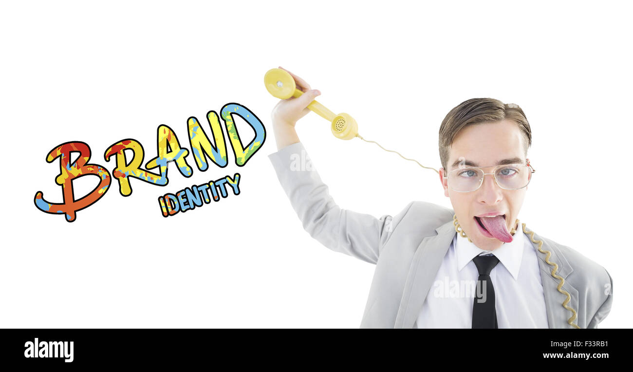 Composite image of geeky businessman being strangled by phone cord ...
