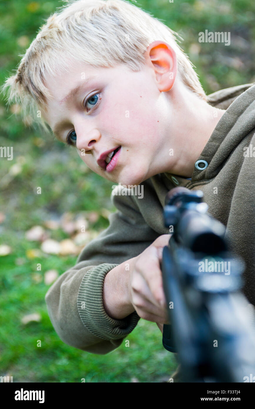 Boy rifle practice hi-res stock photography and images - Alamy