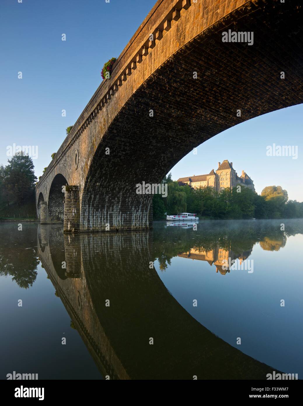 Solesmes abbey reflected into the river sarthe photographed on an still ...