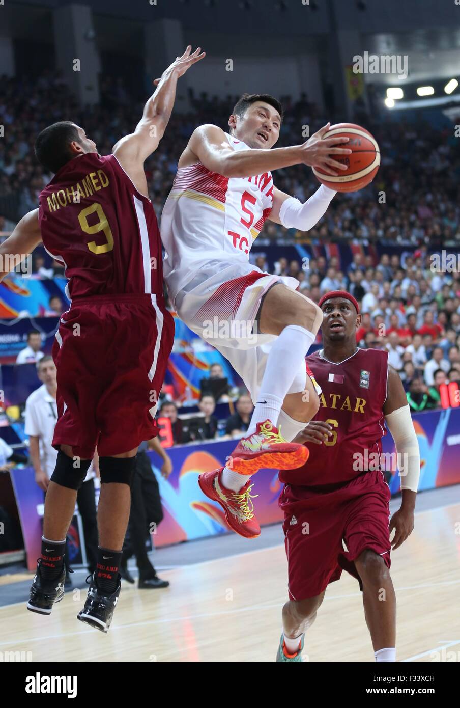 Changsha, China's Hunan Province. 29th Sep, 2015. Liu Wei (C) of China ...