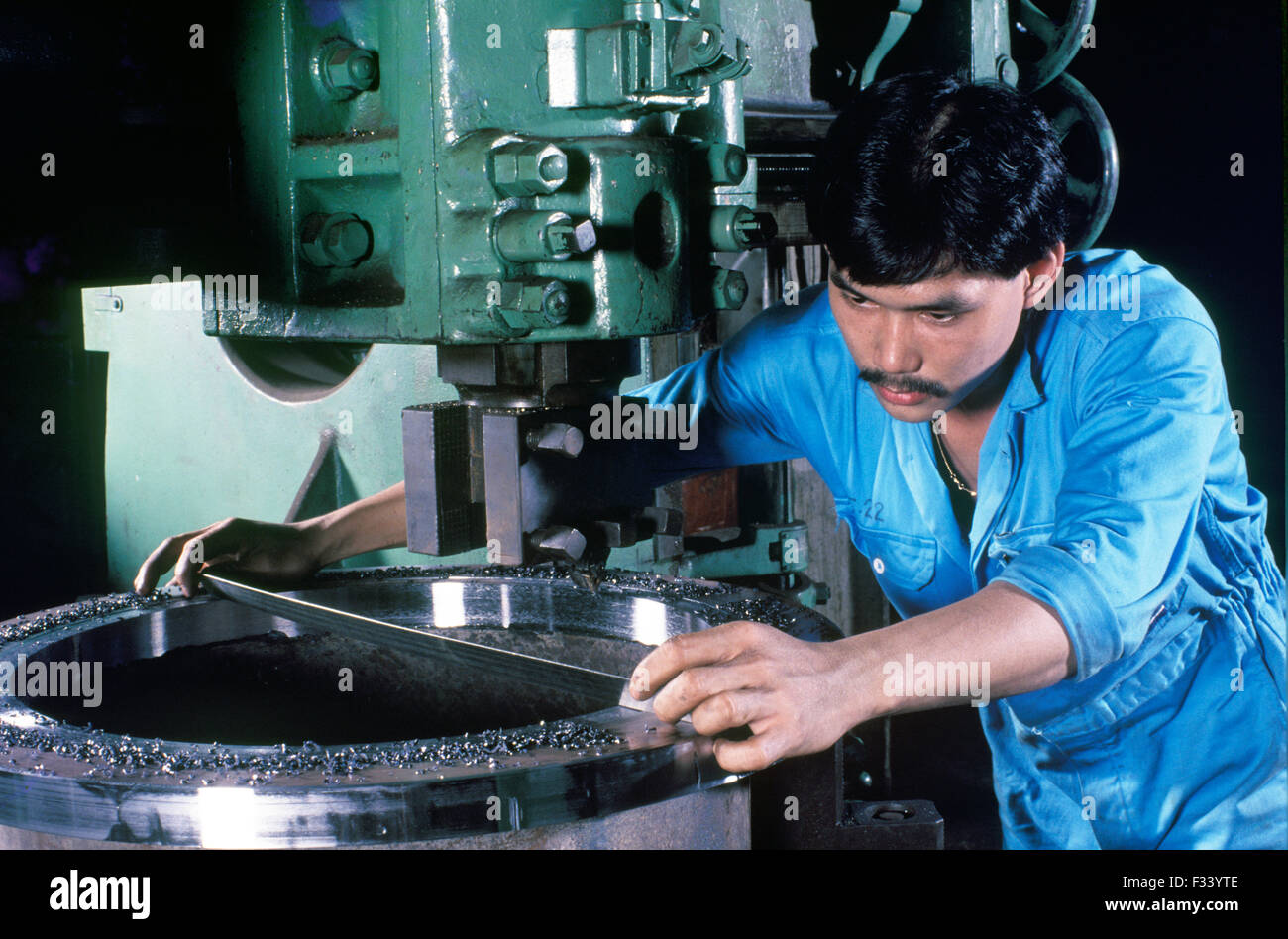 Engineer measuring machining results Stock Photo - Alamy