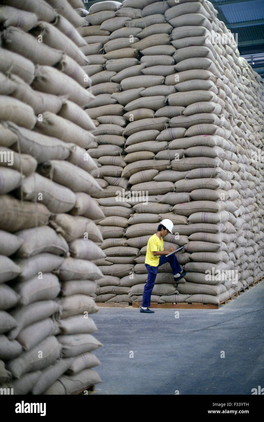 Warehouse worker checking inventory Stock Photo - Alamy