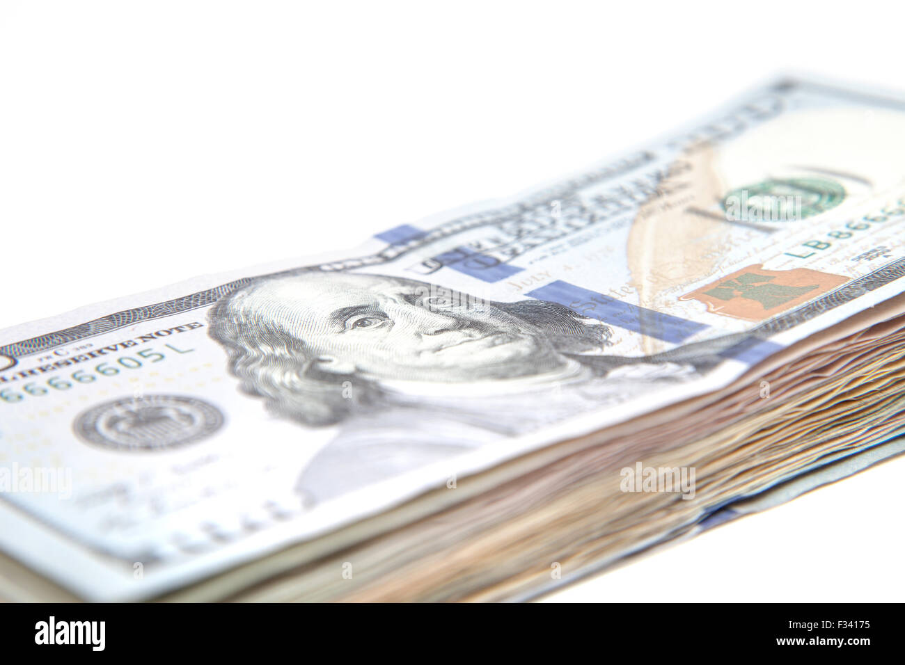 Pile of dollar notes. All on white background Stock Photo - Alamy