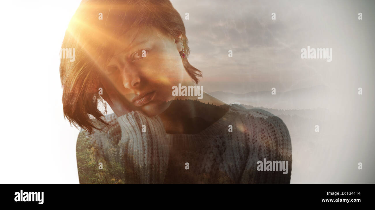 Composite image of pretty brunette feeling sad Stock Photo - Alamy