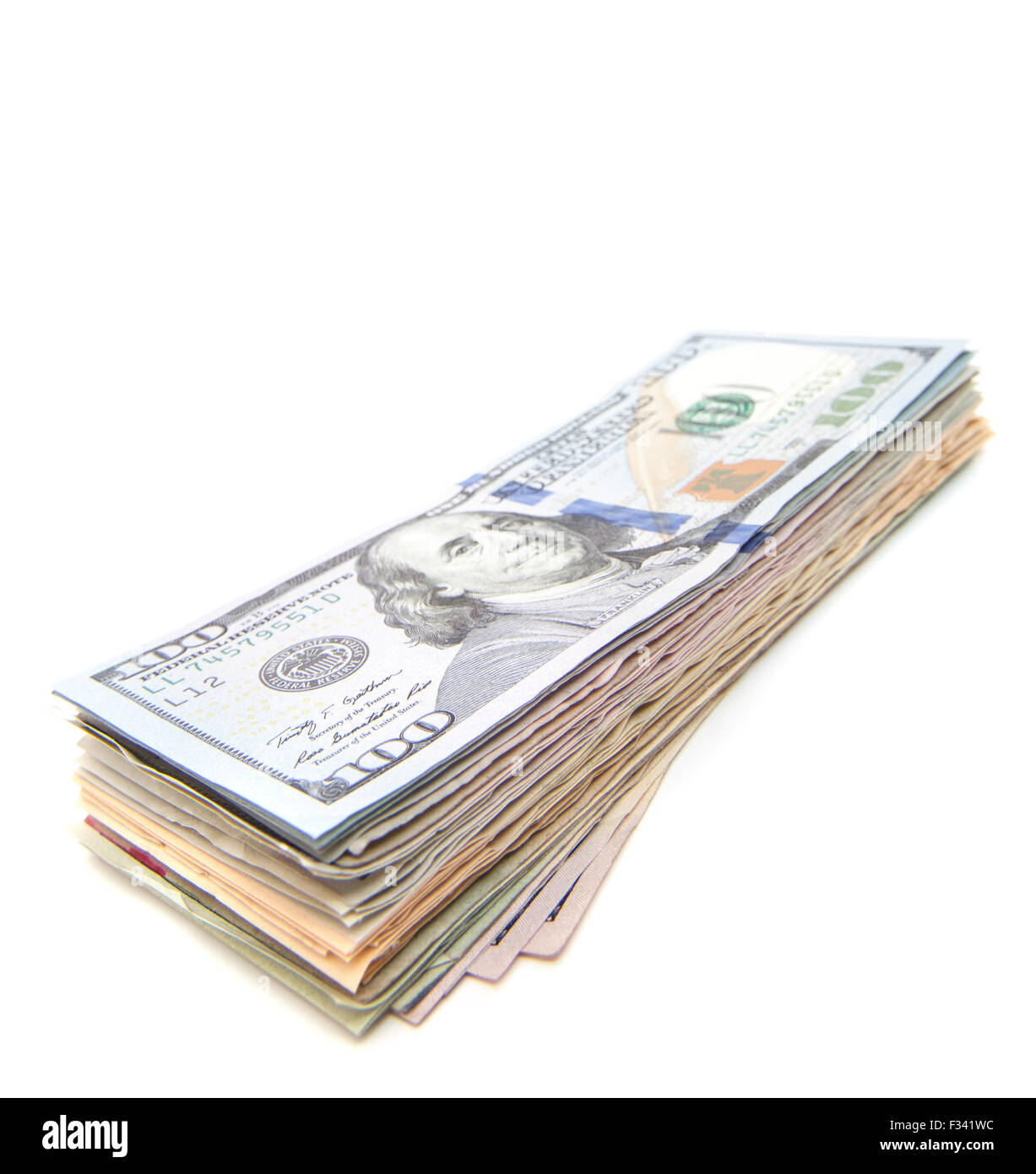 Pile of dollar notes. All on white background Stock Photo - Alamy
