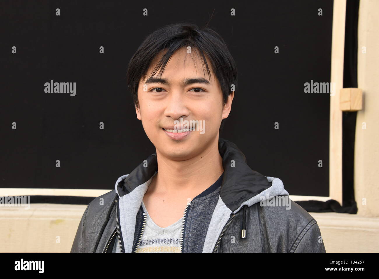 Cologne, Germany. 28th Sep, 2015. Actor Aaron Lee poses during filming ...