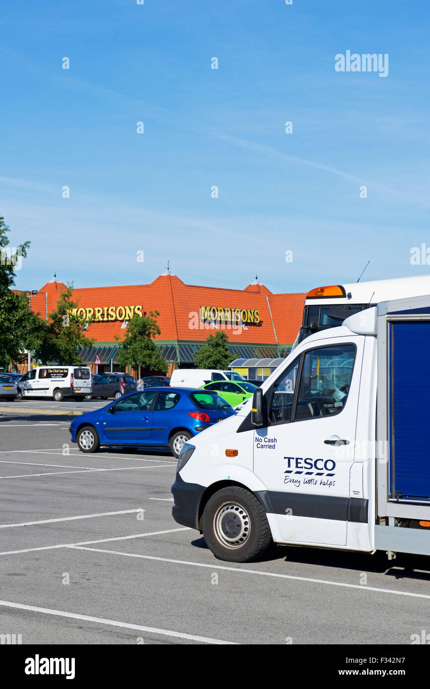 Tesco delivery van parked in the car park of Morrisons supermarket ...