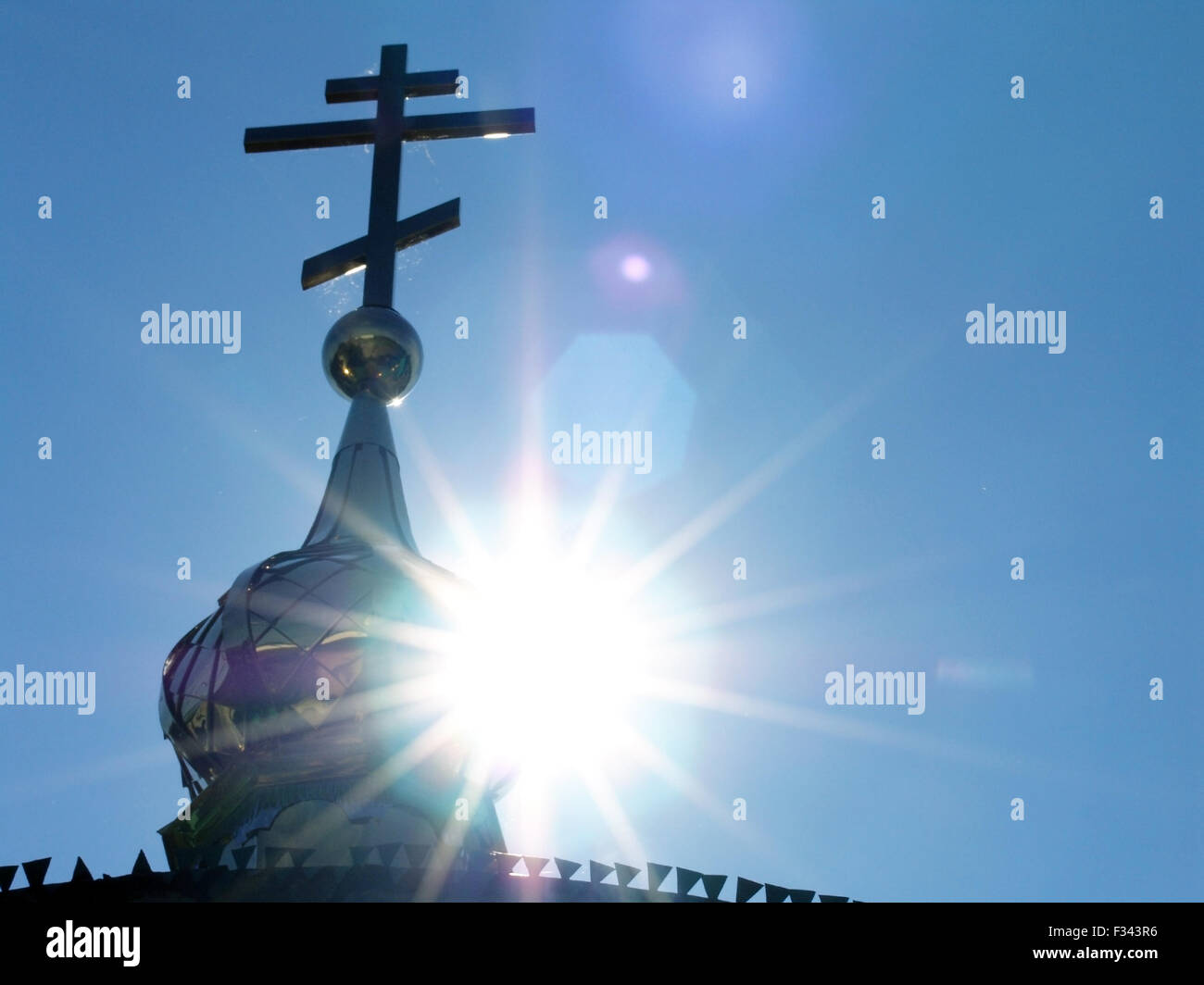 Church dome in sun rays on the sky background Stock Photo - Alamy