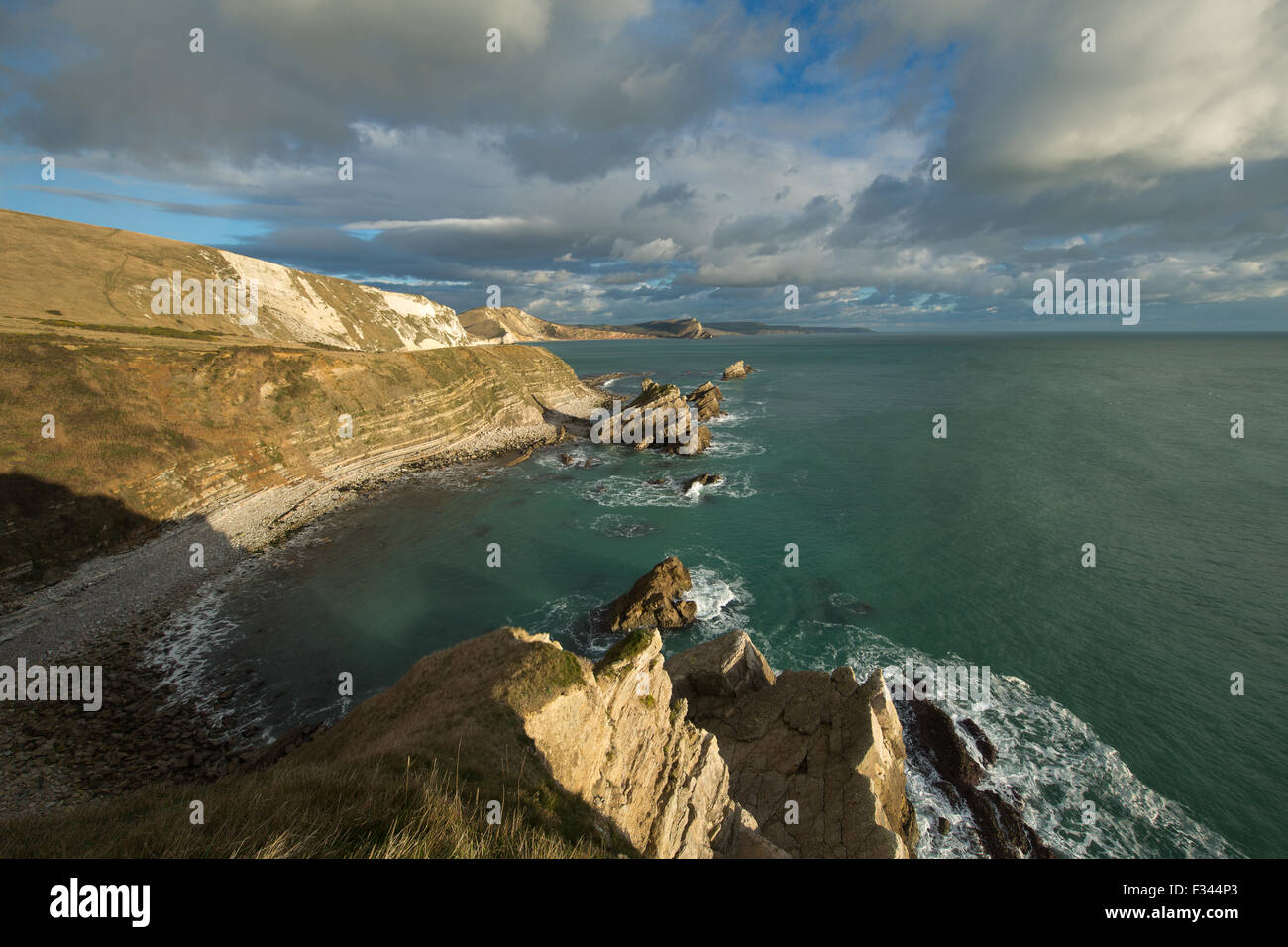 winter light on Mupe Bay, Jurassic Coast, Dorset, England Stock Photo ...
