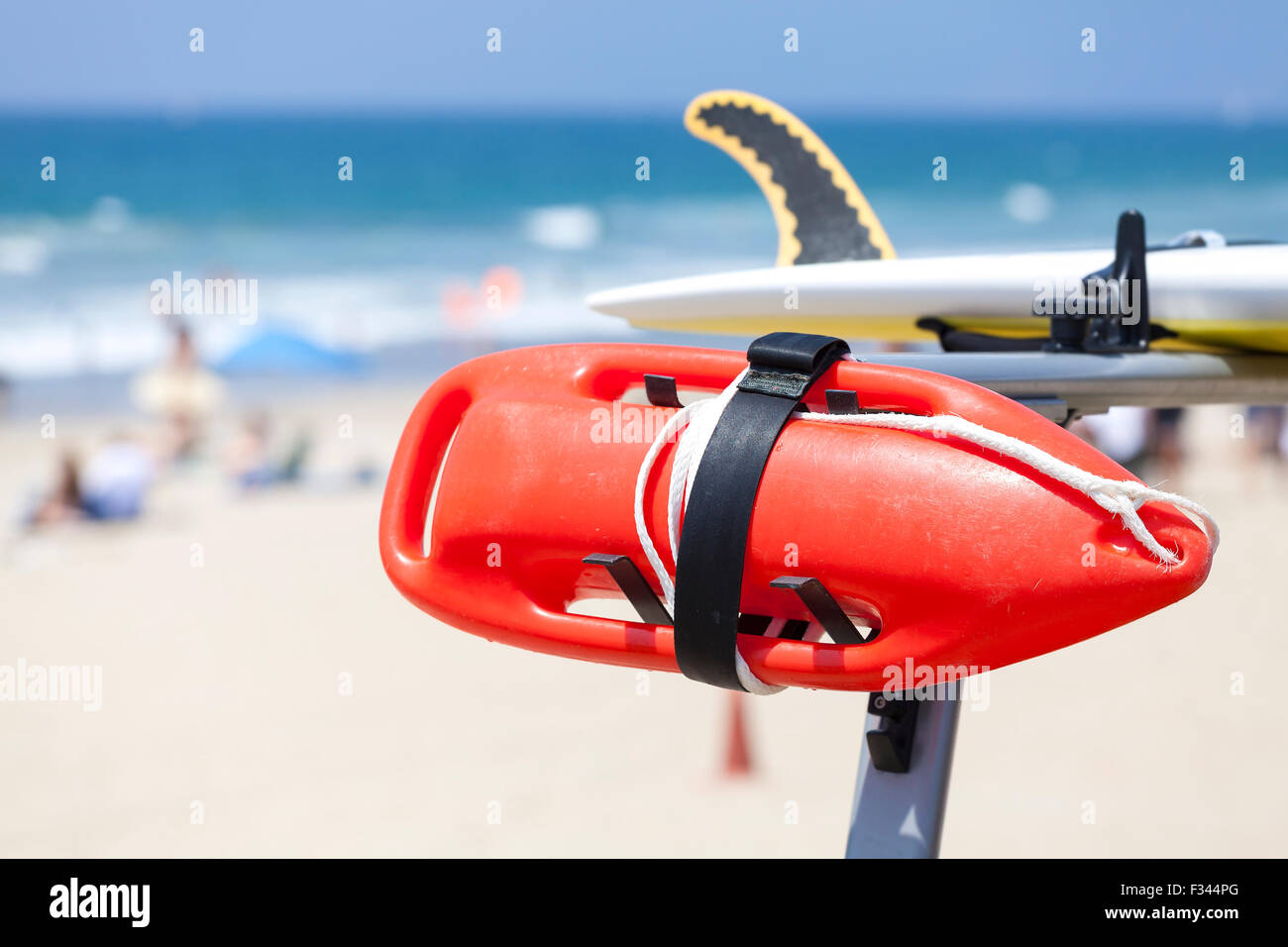 Lifeguard red buoy on a beach, shallow depth of field, space for text ...