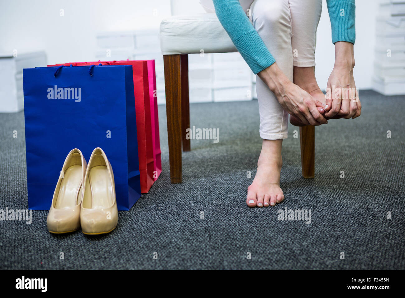 Woman trying on high heel shoes hi-res stock photography and images - Alamy