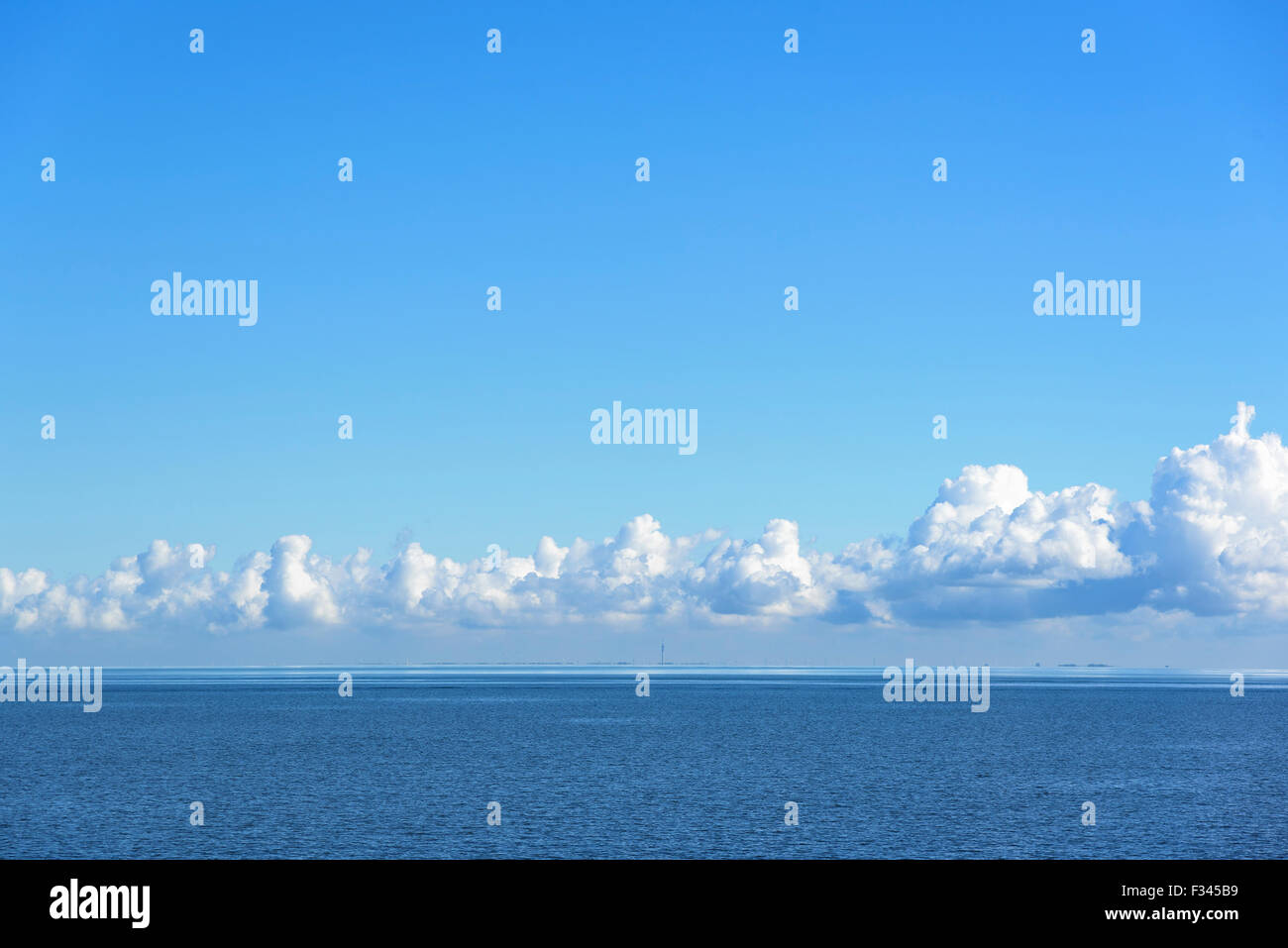 Blue sea and clouds Stock Photo - Alamy