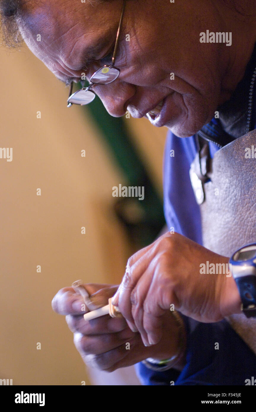 Artisan Adrian Villanueva Quisbert making a charango, a traditional ...