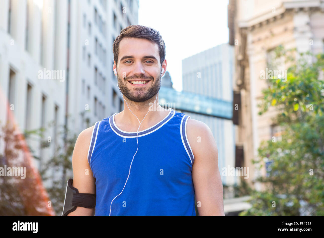 Handsome athlete smiling Stock Photo - Alamy
