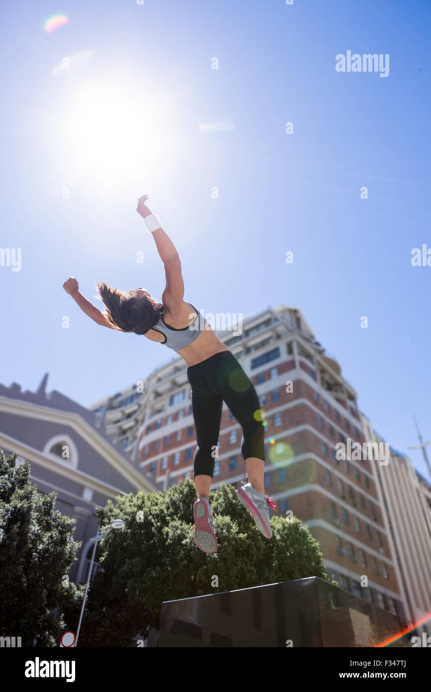 Woman doing parkour in the city Stock Photo - Alamy