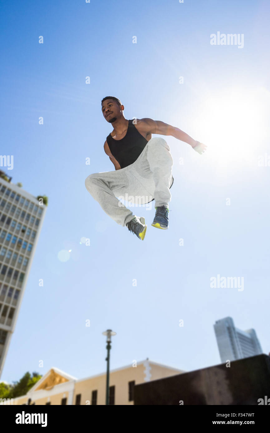 Extreme athlete jumping in the air Stock Photo - Alamy