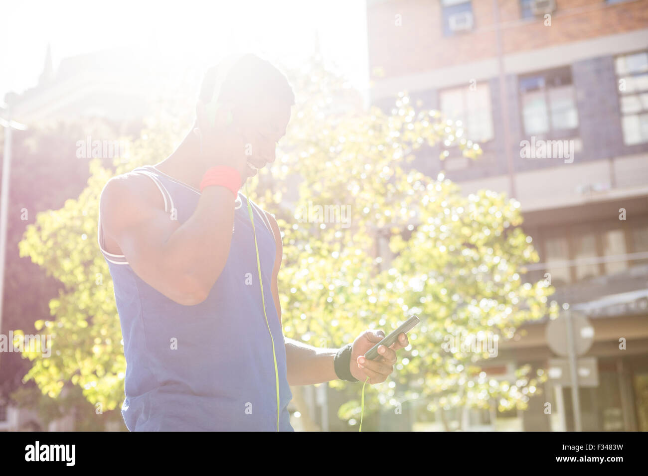 Athlete man using mobile hi-res stock photography and images - Alamy